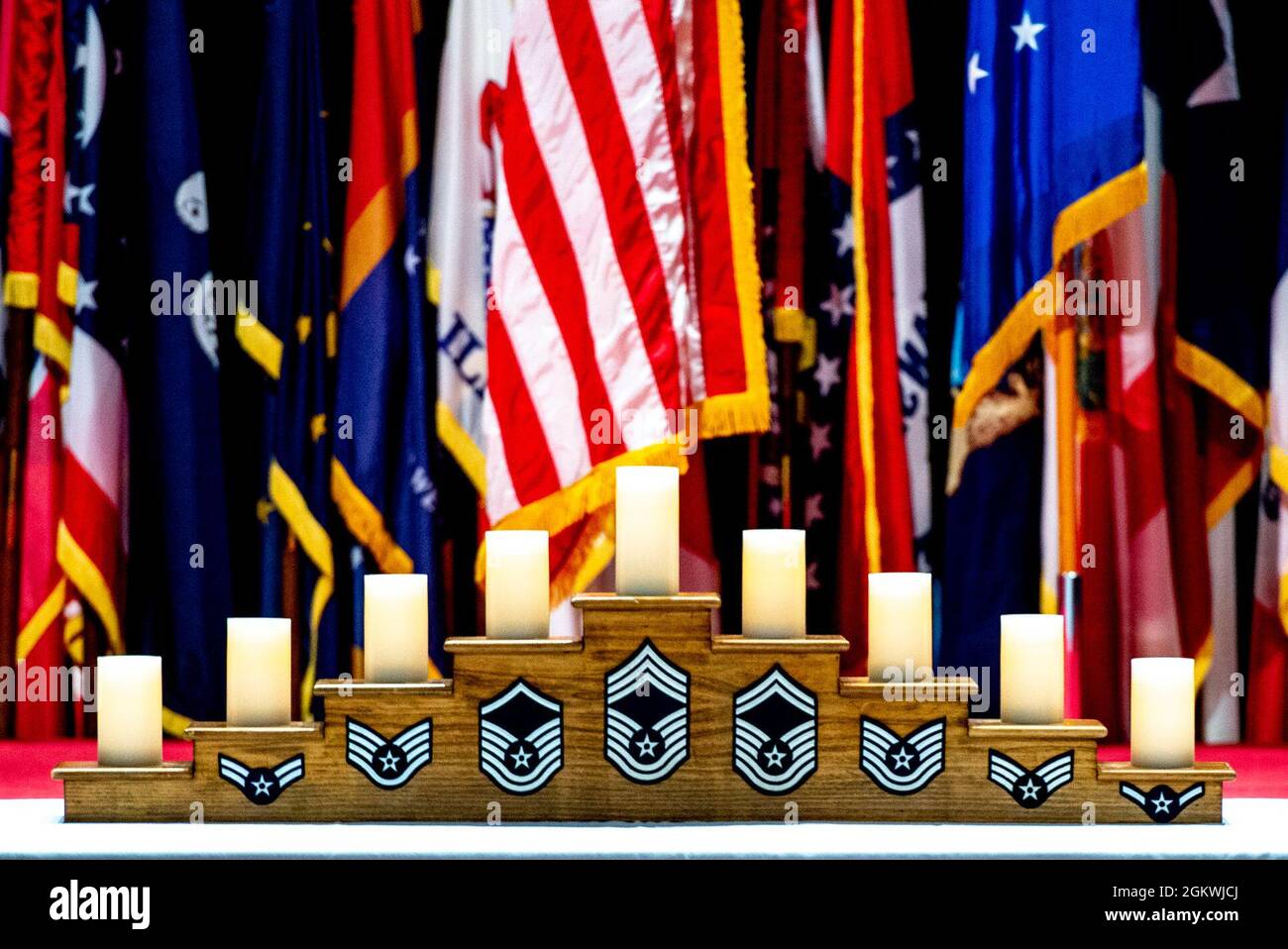 A wooden rank structure sits lit by nine candelabras during the Chief ...