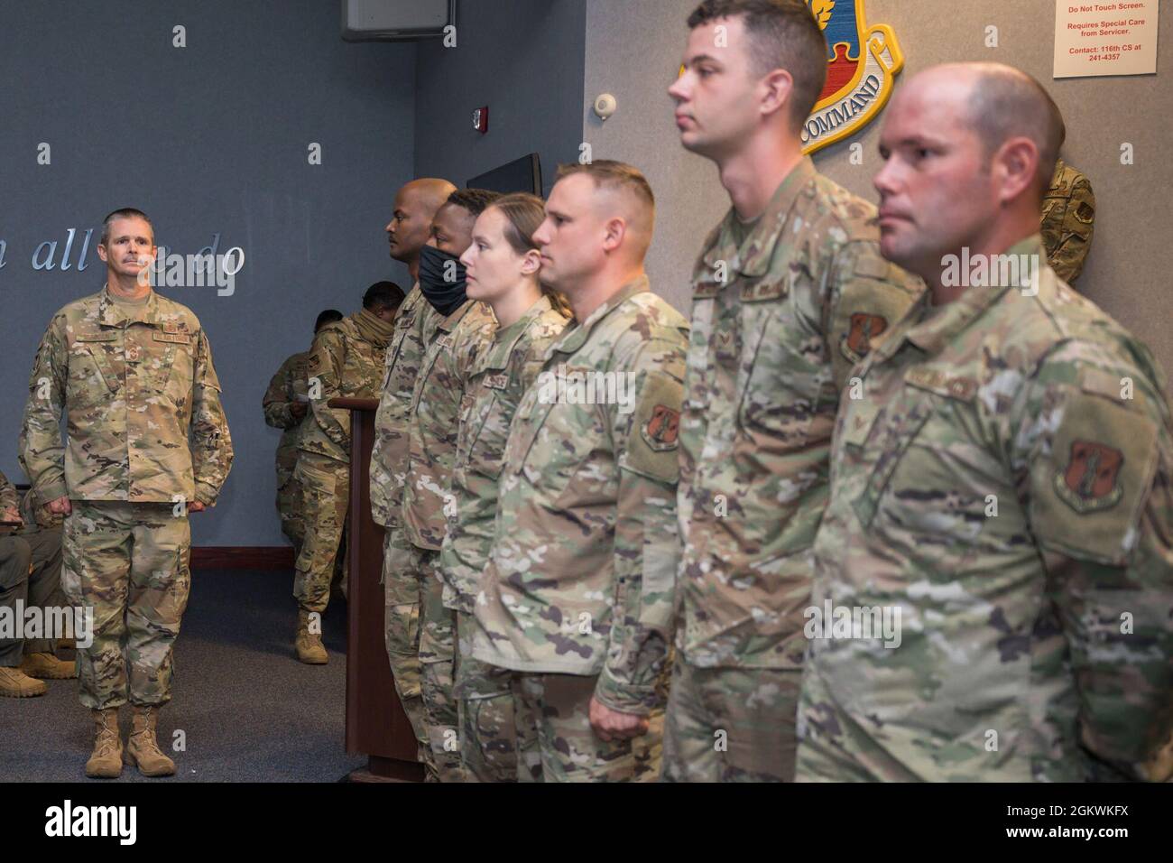 U.S. Air Force Chief Master Sgt. Rayford Robinson, left, command chief ...