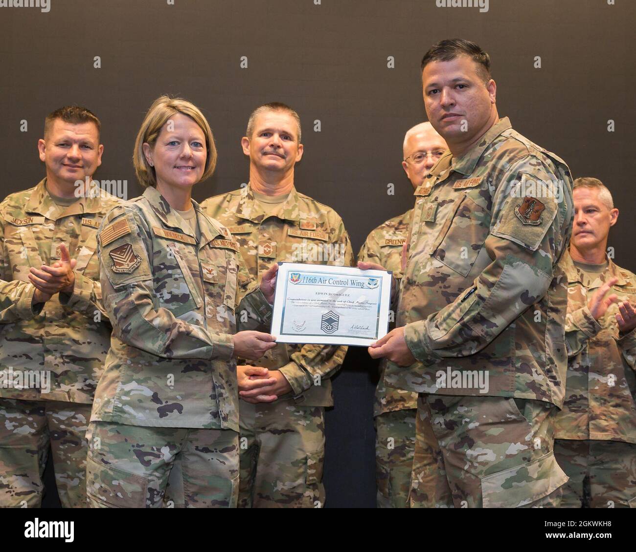 U.S. Air Force Col. Amy Holbeck, front left, commander of the 116th Air ...