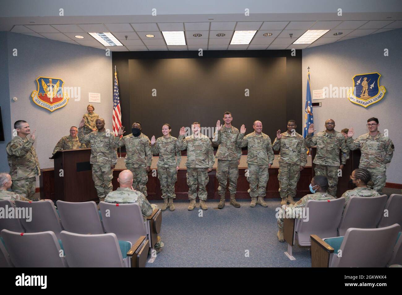 U.S. Air Force Chief Master Sgt. Rayford Robinson, left, command chief ...