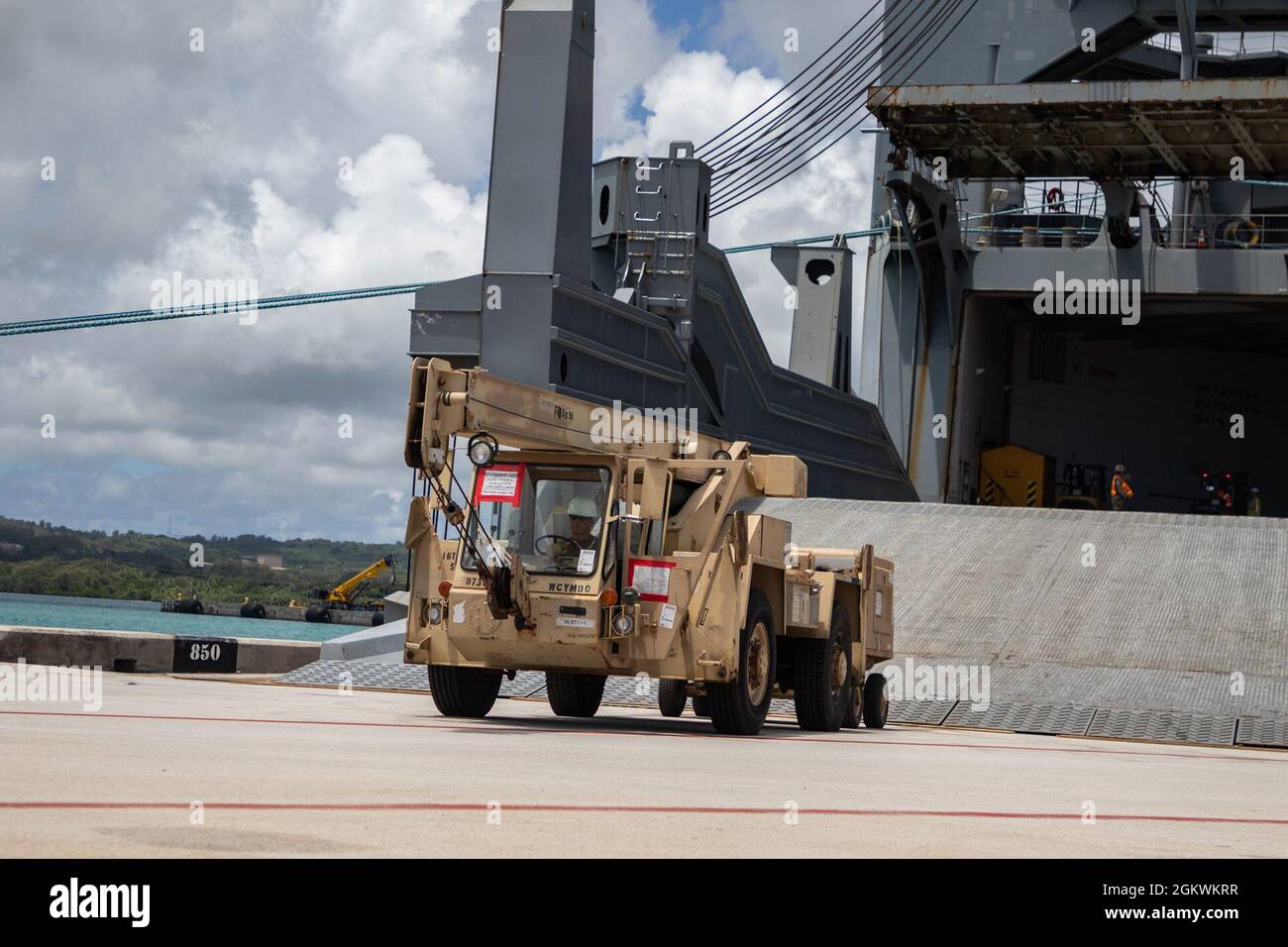U.S. Army Soldiers download military vehicles from the Cape Henry ...