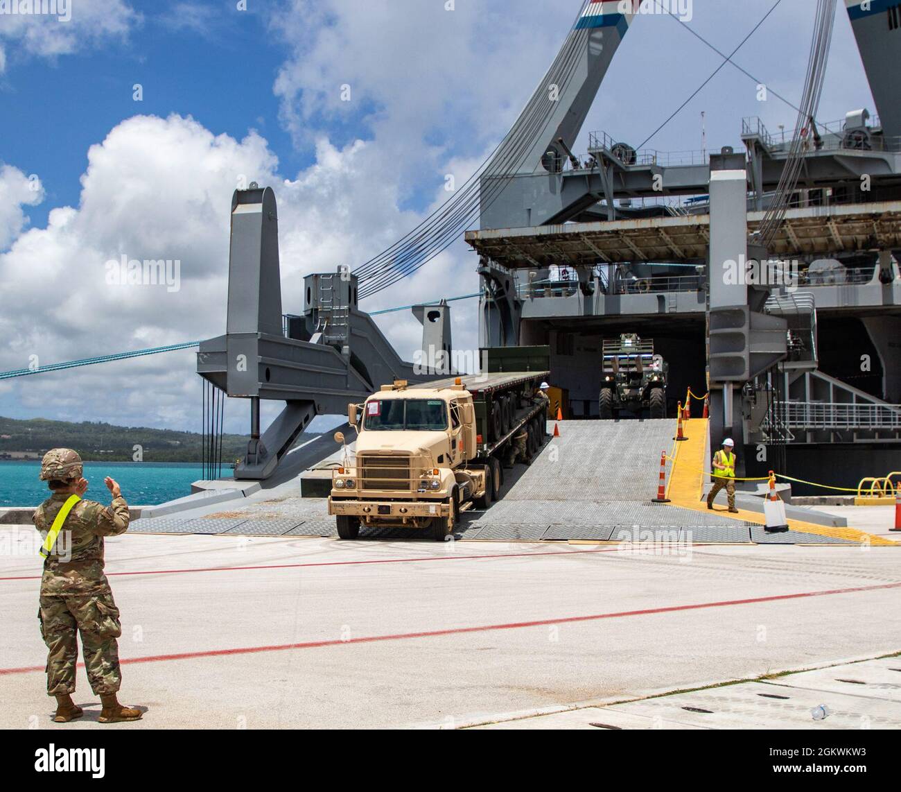 A U.S. Army Soldier directs military vehicles from the Cape Henry ...