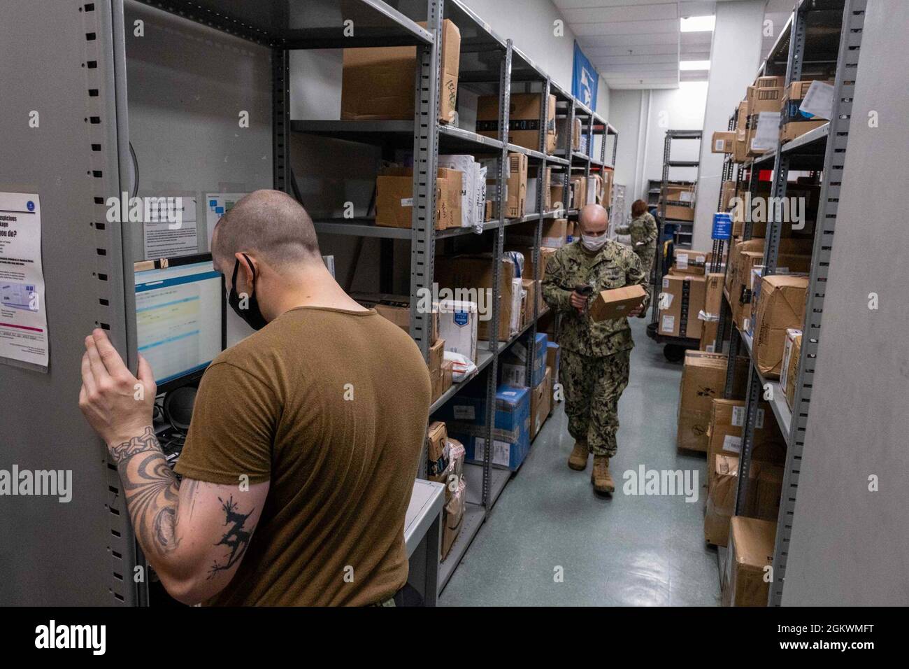 MANAMA, Bahrain (July 11, 2021) – Capt. Timothy Griffin, center ...