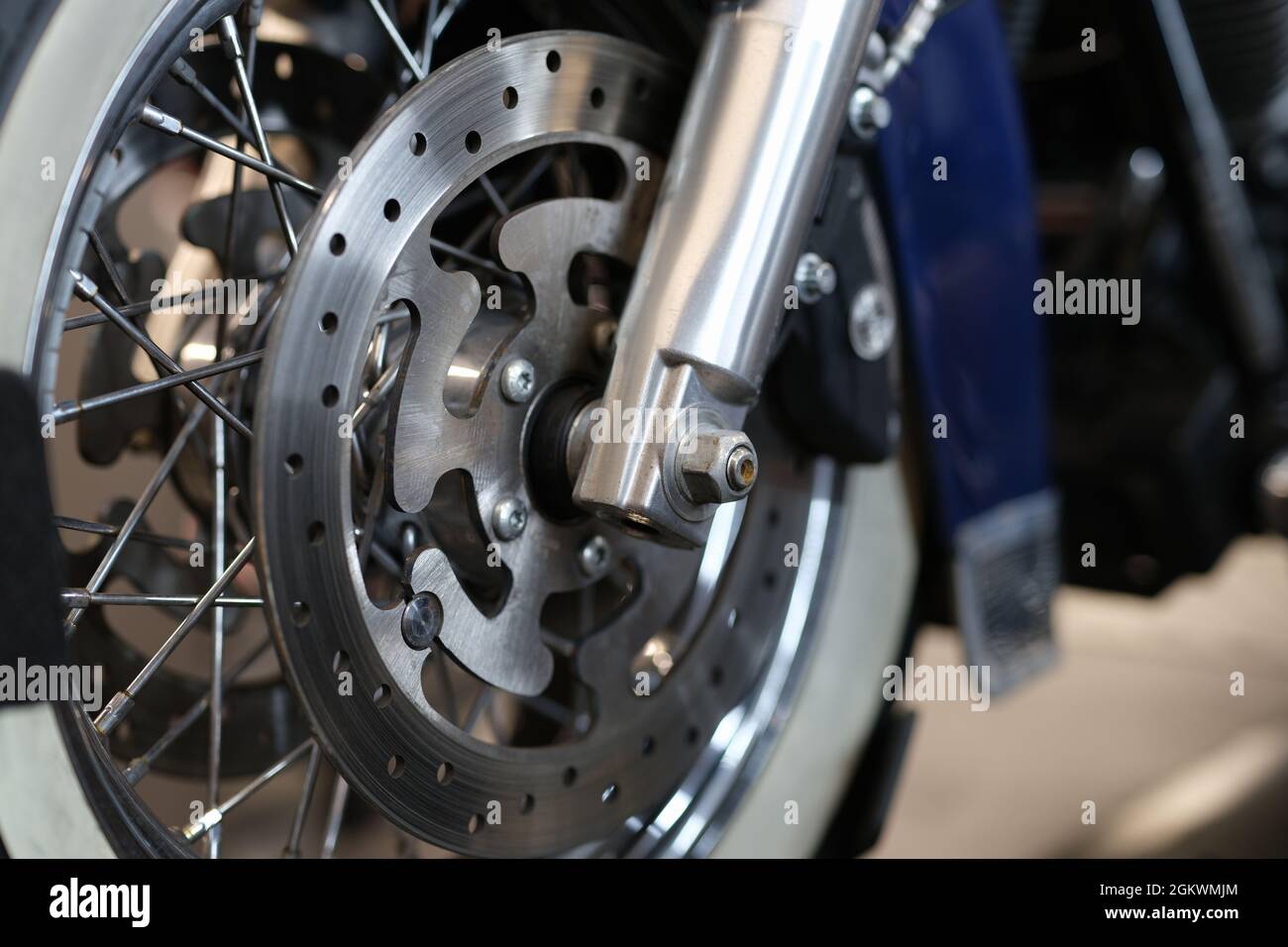 Closeup of brake disc on motorcycle wheel Stock Photo - Alamy