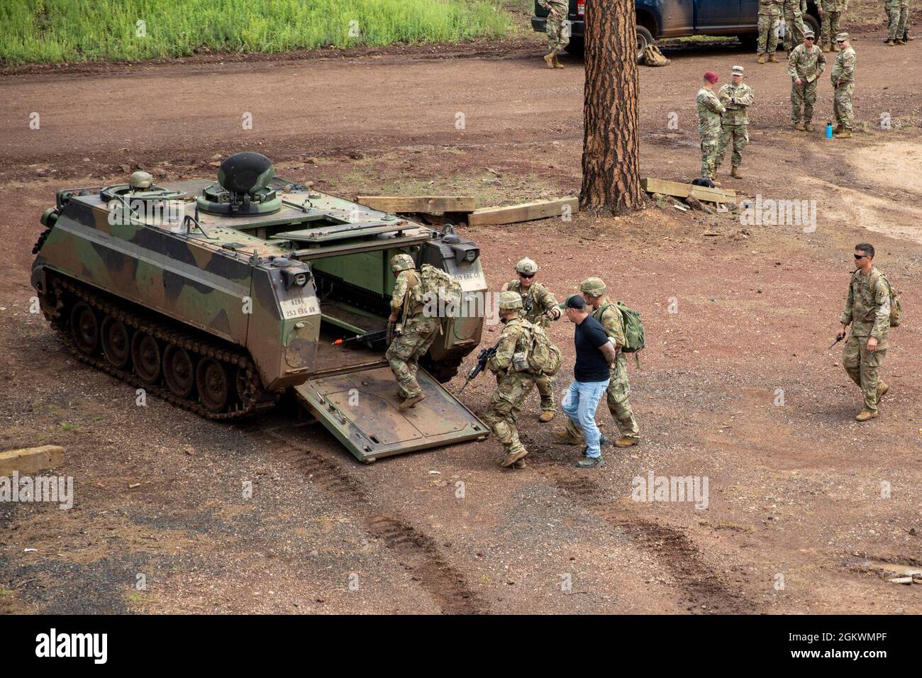 Soldiers from the Arizona Army National Guard's 819th Sappers drive an ...