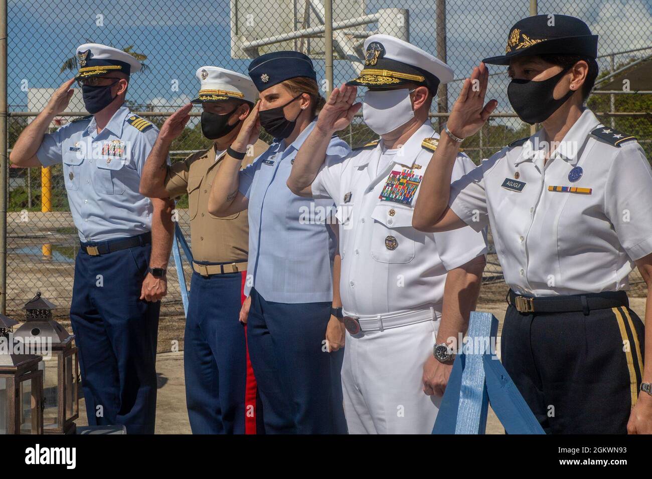 Marine Corps Base (MCB) Camp Blaz senior leaders render a salute during ...
