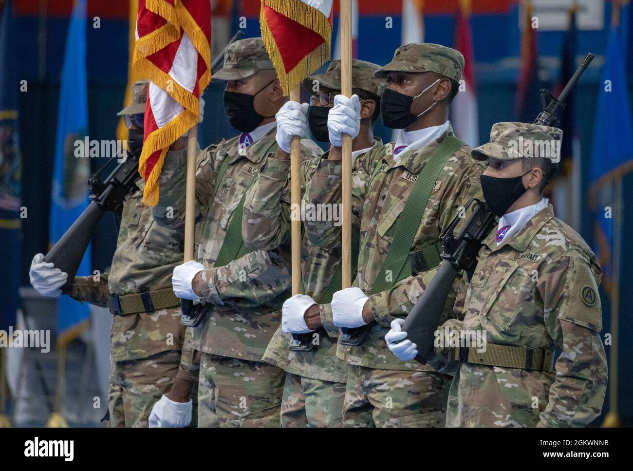 The Area Support Group - Kuwait Color Guard stand in formation during a ...
