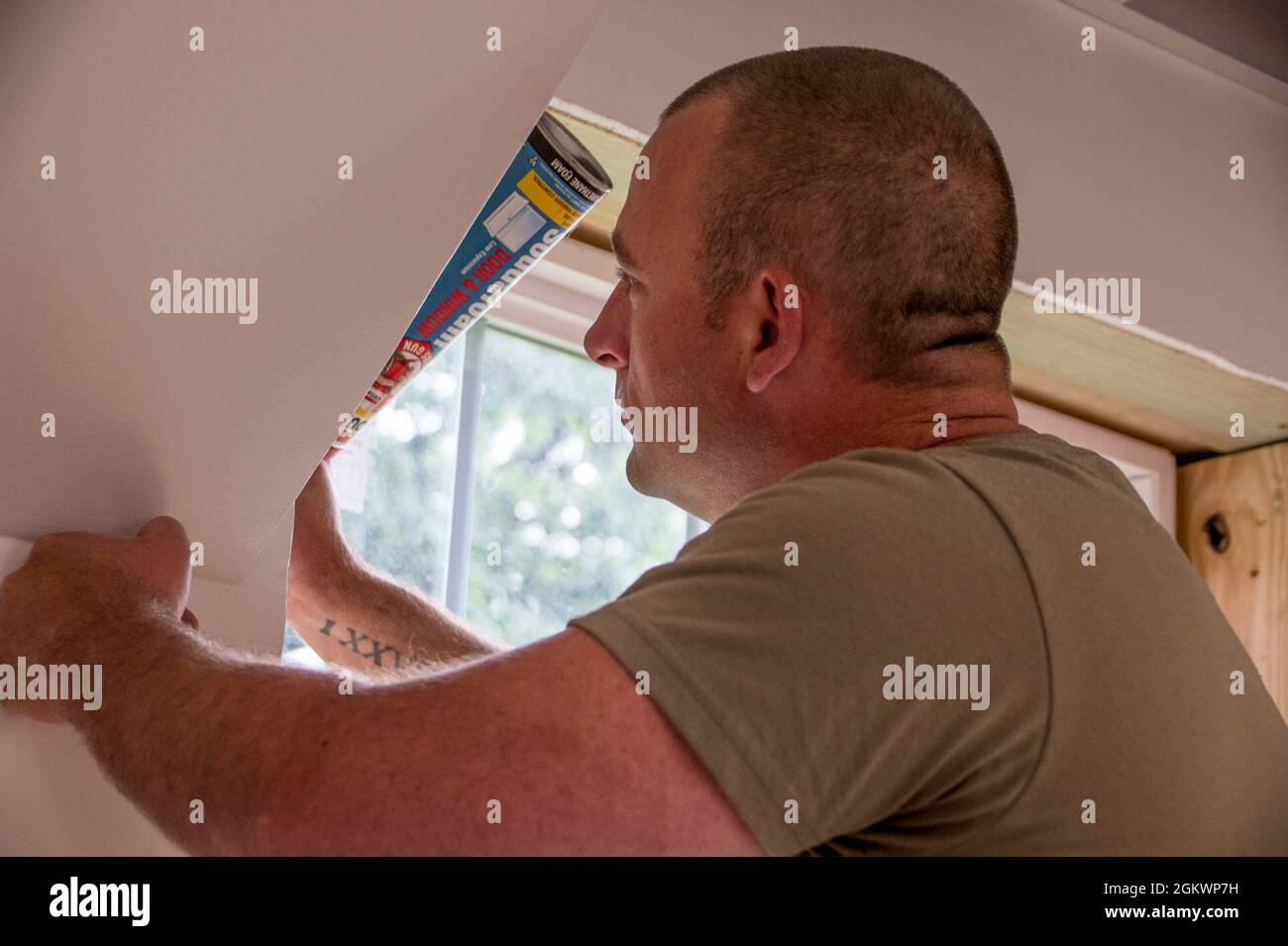 Tech. Sgt. Kenneth Riley a Structures Journeyman with the 143d Airlift ...