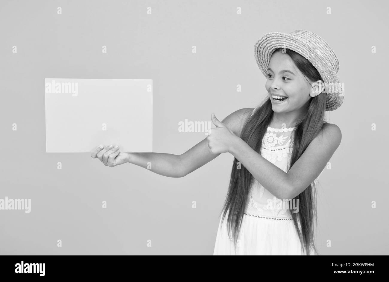 Kid traveler. Summer sales. Happy little girl hold poster copy space ...