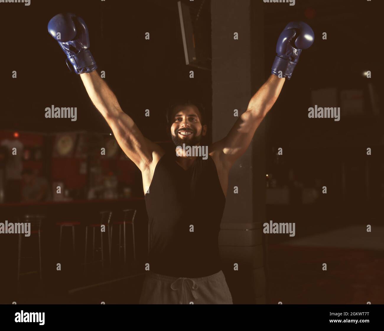 Young professional boxer winning competition Stock Photo - Alamy
