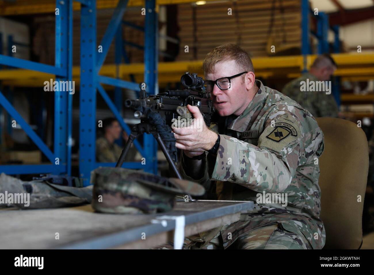 U.S. Army National Guard Spc. Adam Wick, an infantryman assigned to ...