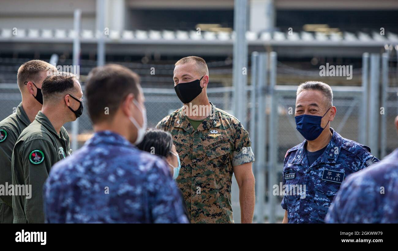 Marine Corps Lt. Col. Timothy Farag (left), commanding officer of ...