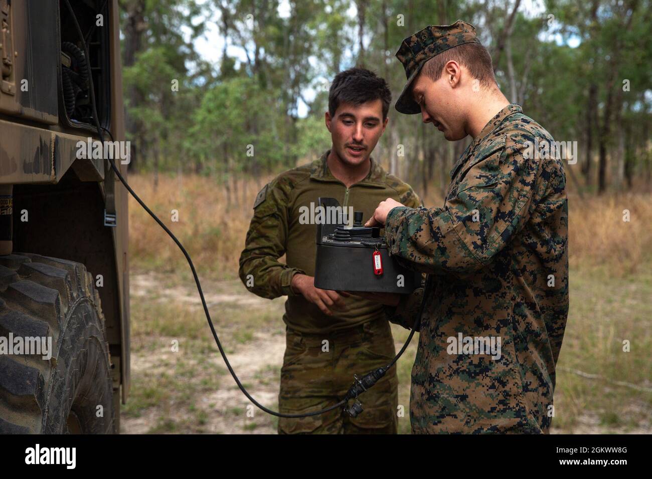 Australian Defence Force craftsman Jayden Eva (left), a recovery ...