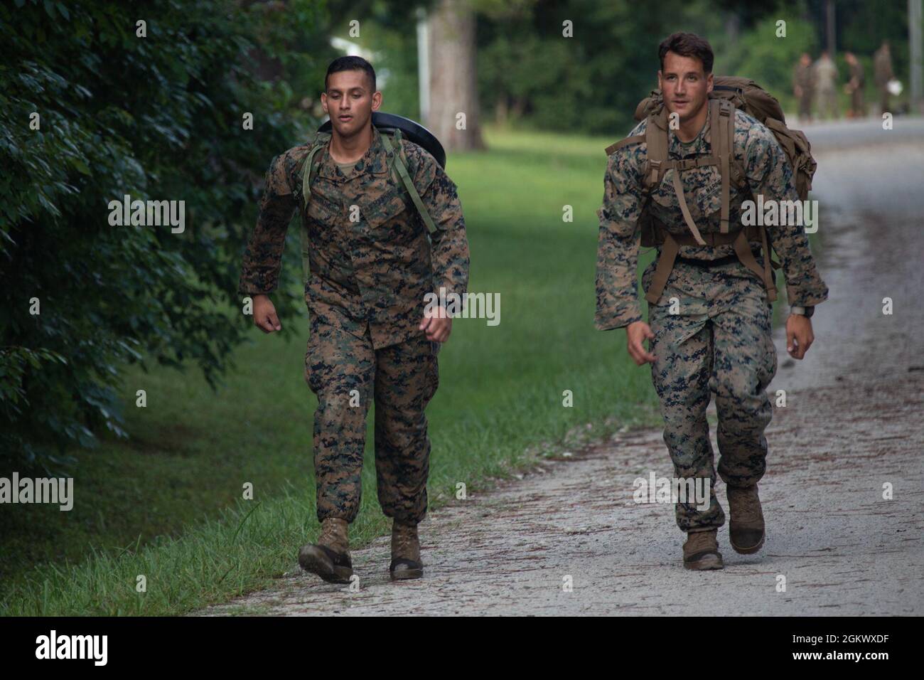 U.S. Marine Corps Sgt. Jesus Montano, left, and Staff Sgt. Kyle W ...