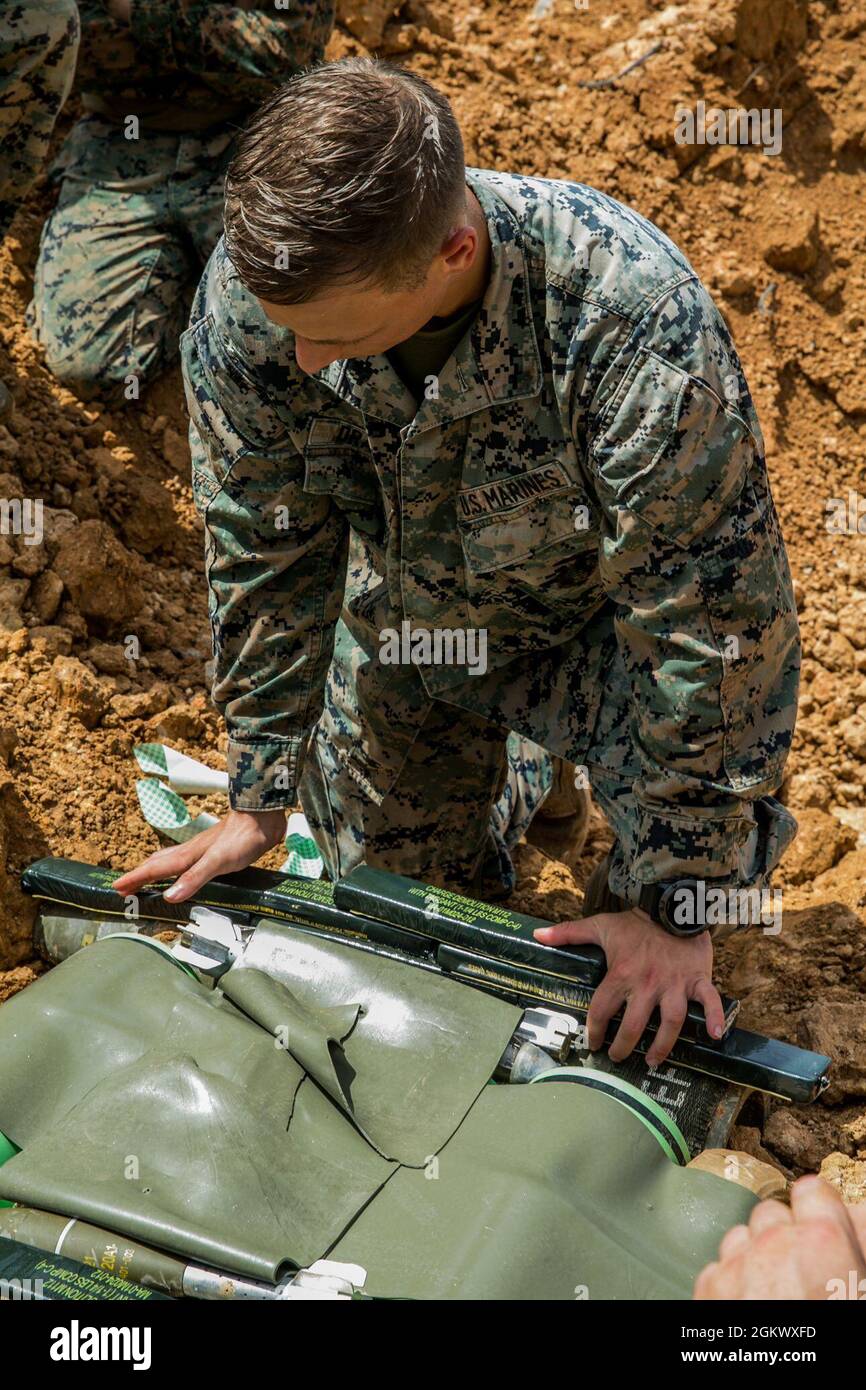 A U.S. Marine with 9th Engineer Support Battalion, 3d Marine Logistics ...