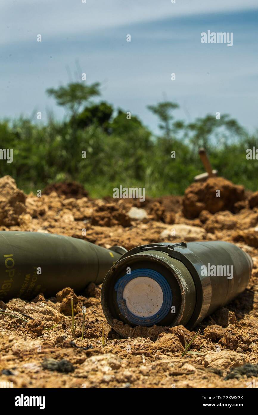 U.S. Marine Corps 155mm artillery rounds await detonation and disposal ...