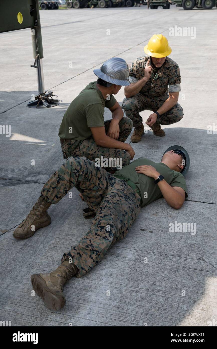 U.S. Marines with Marine Wing Support Squadron 171 monitor a notionally ...
