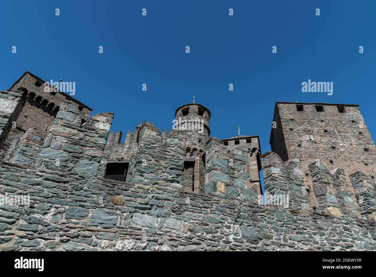 The castle of Fénis, located in the municipality of the same name, is ...