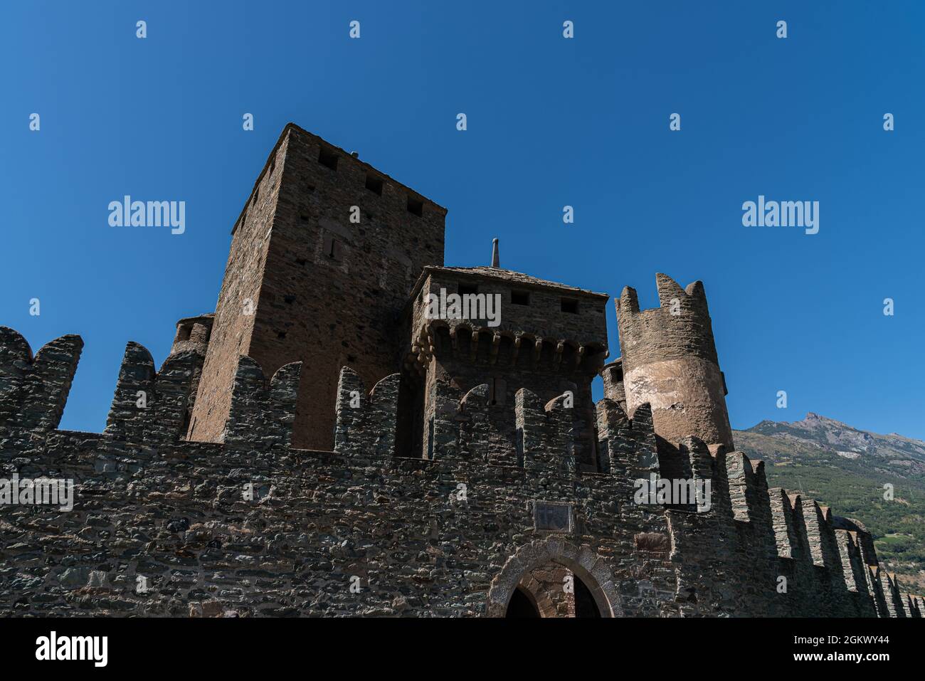 The castle of Fénis, located in the municipality of the same name, is ...