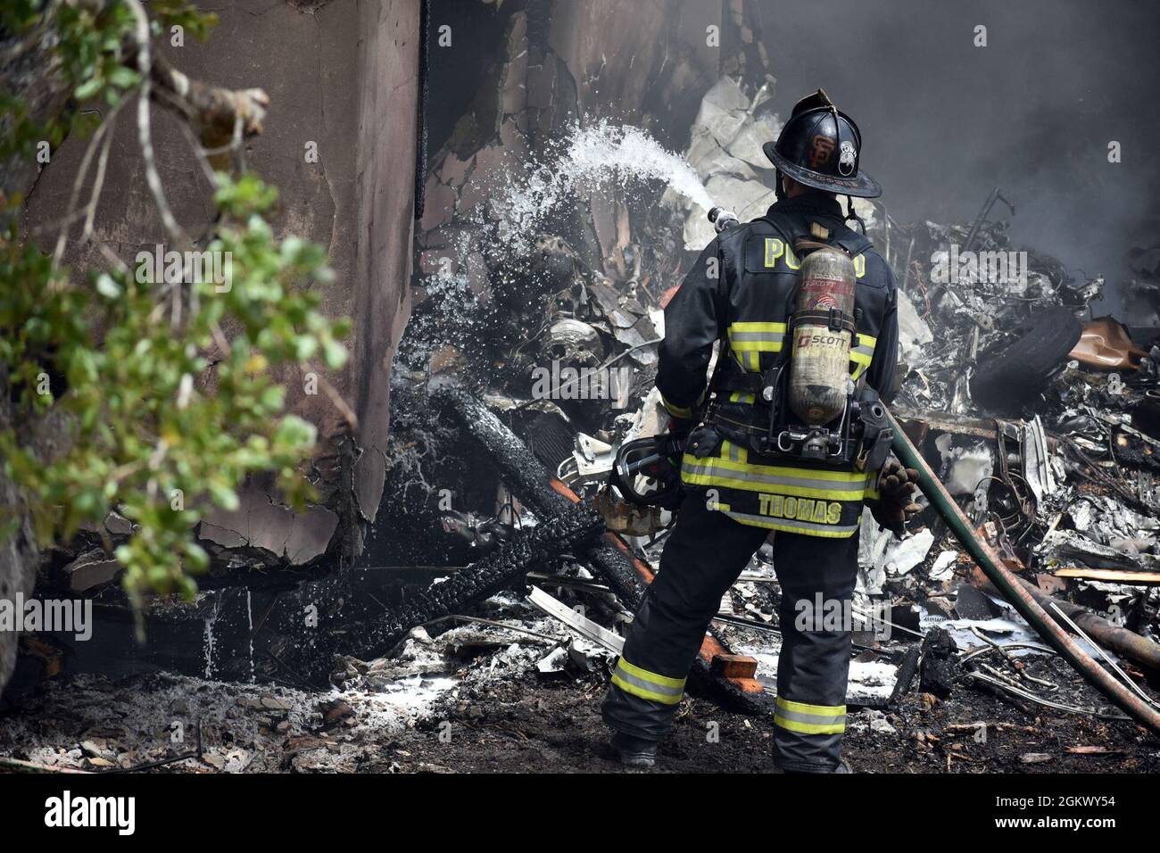 Lt. Andrew Thomas of the Presidio of Monterey Fire Department works at ...