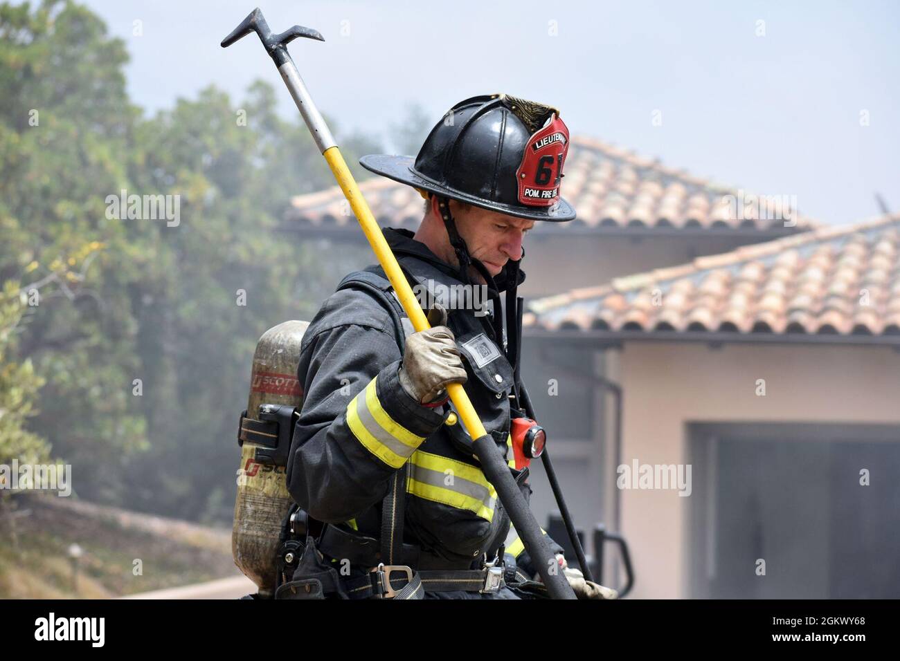 Lt. Andrew Thomas of the Presidio of Monterey Fire Department works at ...