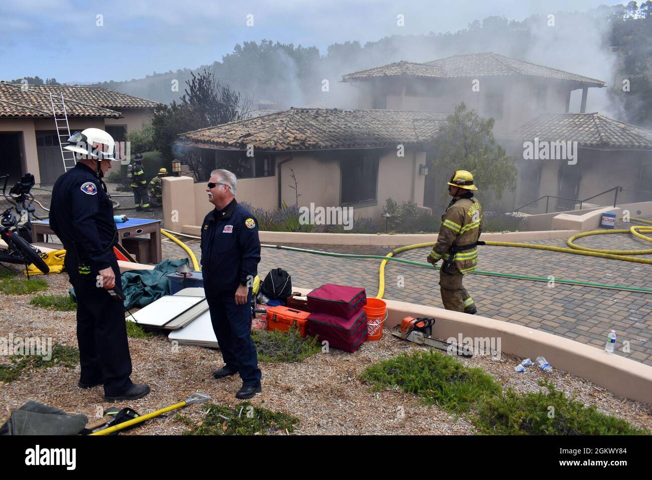 Tom Joyce, right, chief of the Presidio of Monterey Fire Department ...