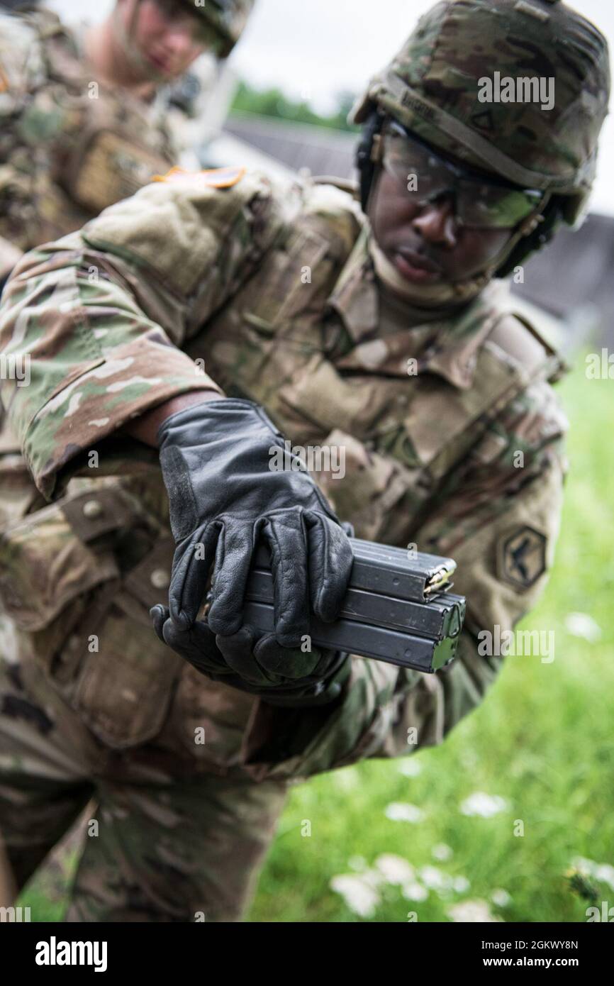 U.S. Army Spc. John Dagrin, Information Technology Specialist assigned ...