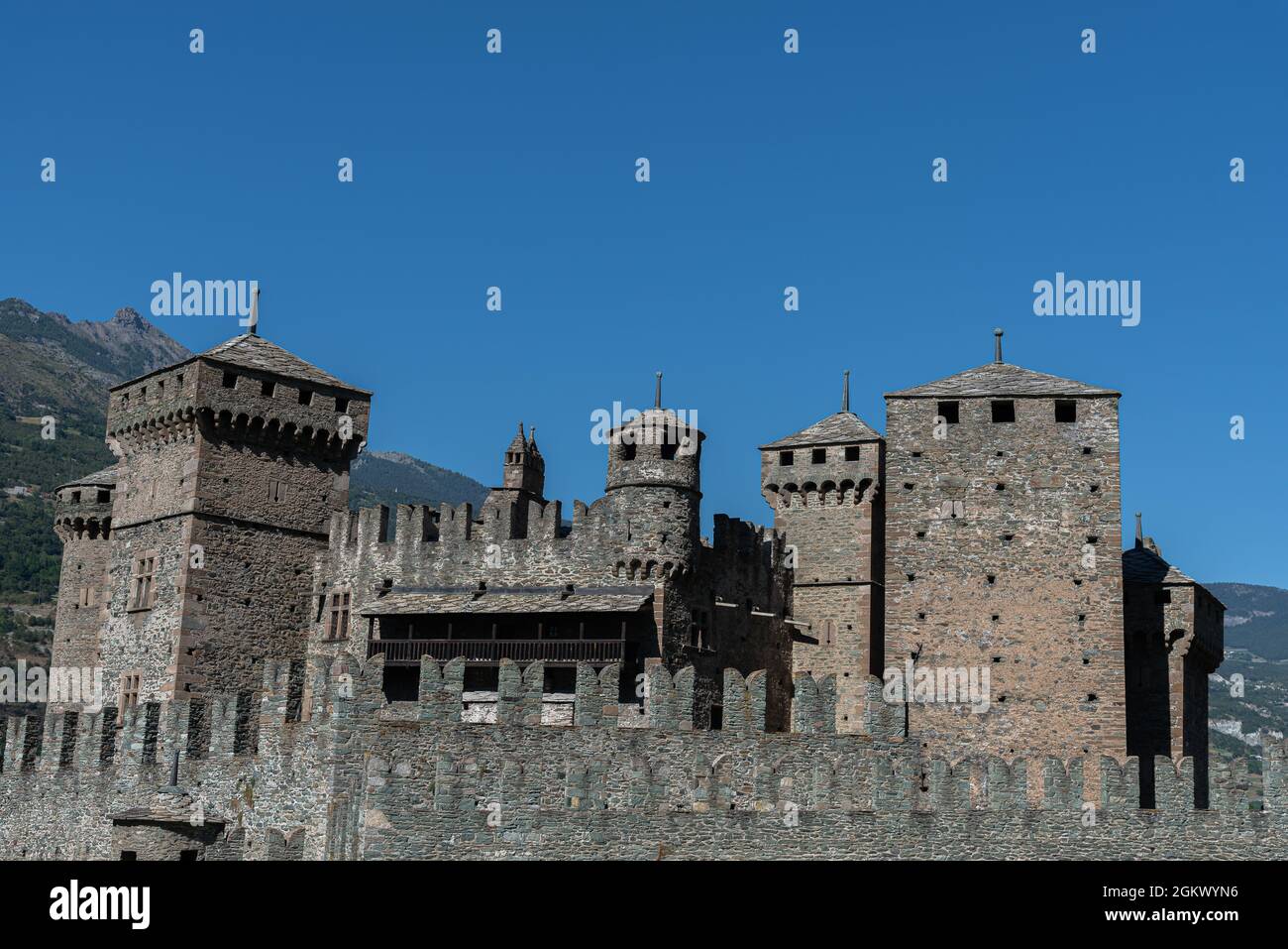 The castle of Fénis, located in the municipality of the same name, is ...