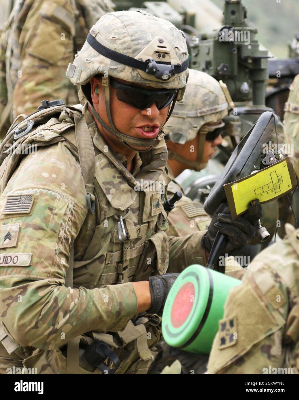 A Soldier with Battery B, 2nd Battalion, 77th Field Artillery Regiment ...