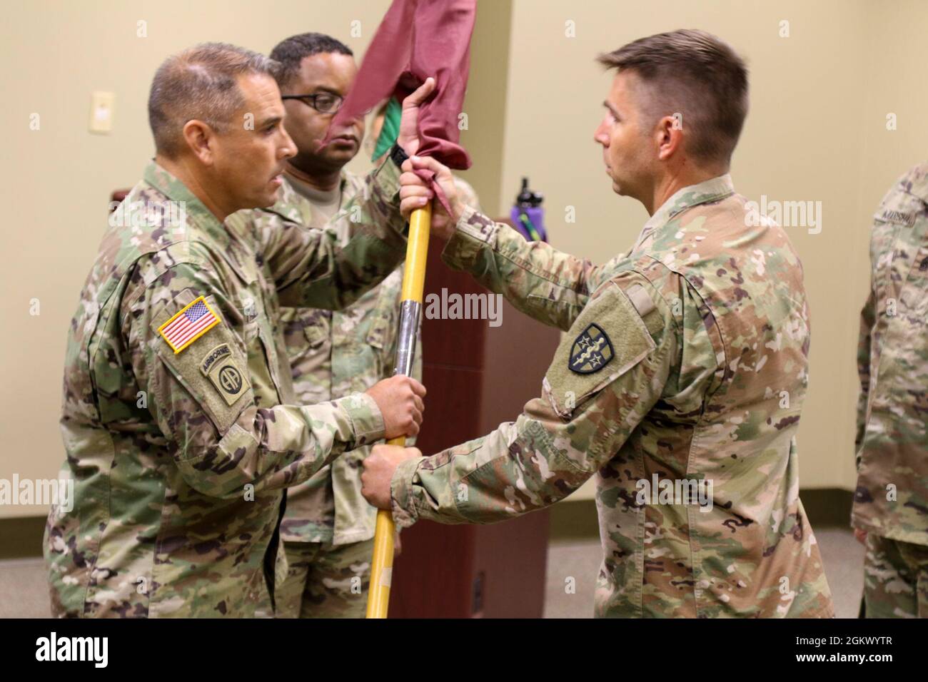 Army Reserve Col. Neil Thowe, right, former commander of the 7306th ...