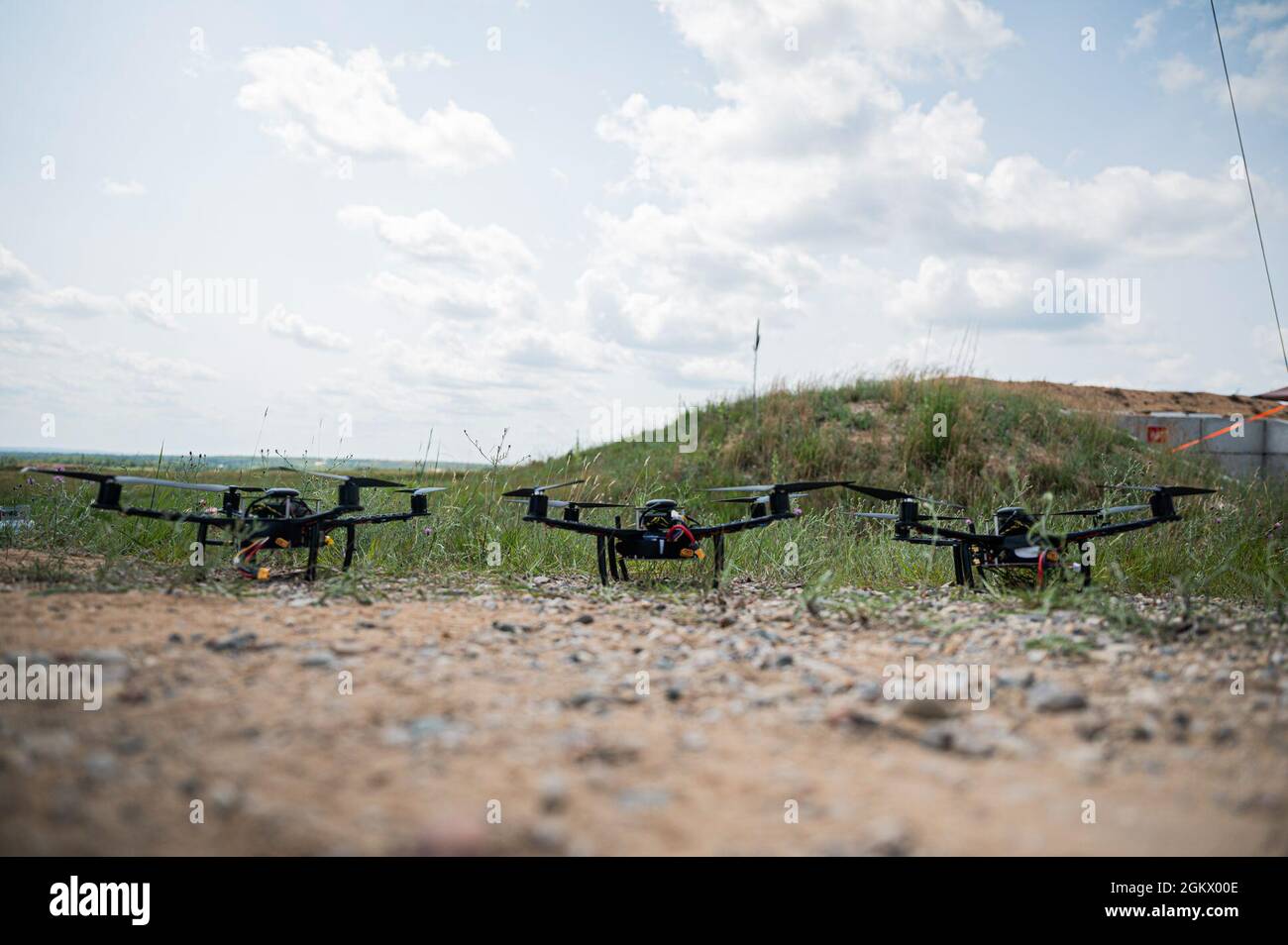 Three unmanned aircraft systems lay on the ground during the Global ...