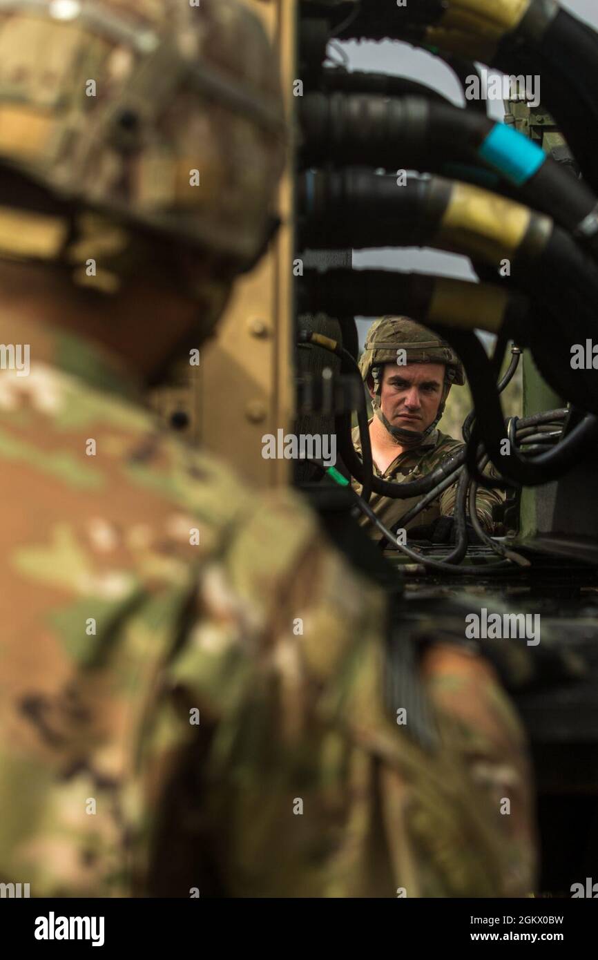 U.S. Army Specialist Aaron Moller, an Army Patriot Launching Station ...