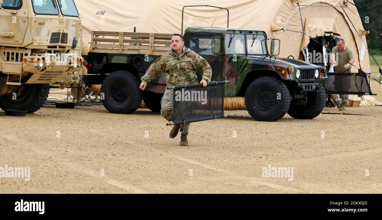 Army Reserve Pfc. Michael Marotta, a medic with the 691st Medical ...