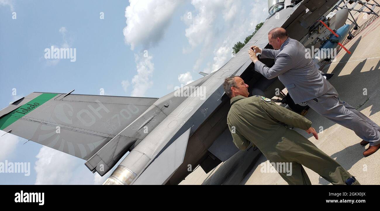 Mayor of Toledo, Mr. Wade Kapszukiewicz, snaps a photo of the Toledo ...