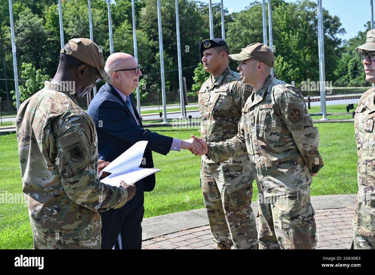 Acting Secretary of the Air Force John P. Roth greets Airmen during a ...