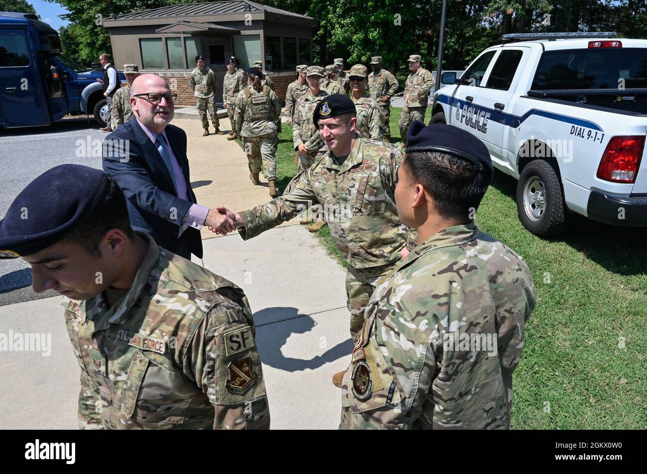 Acting Secretary of the Air Force John P. Roth greets security forces ...