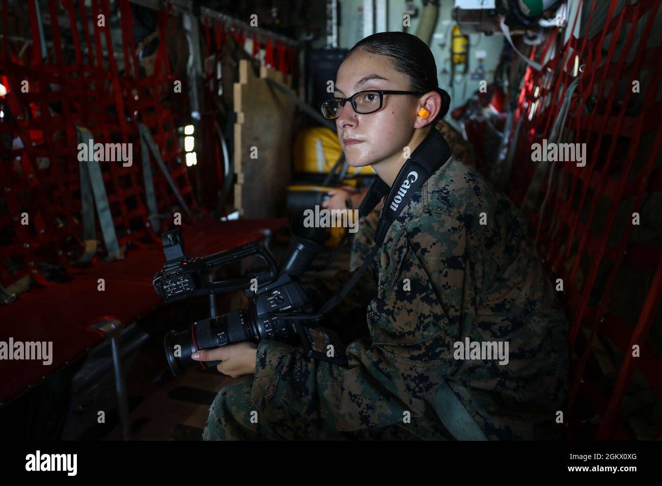 U.S. Marine Corps Lance Cpl. Madison Santamaria, a combat videographer ...