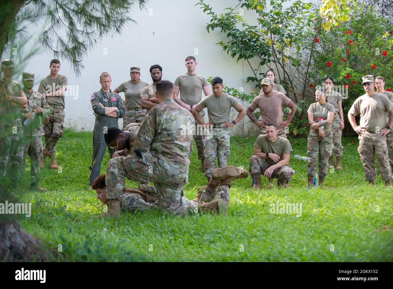 U.S. Airmen from the 18th Wing observe a detaining procedure during a ...