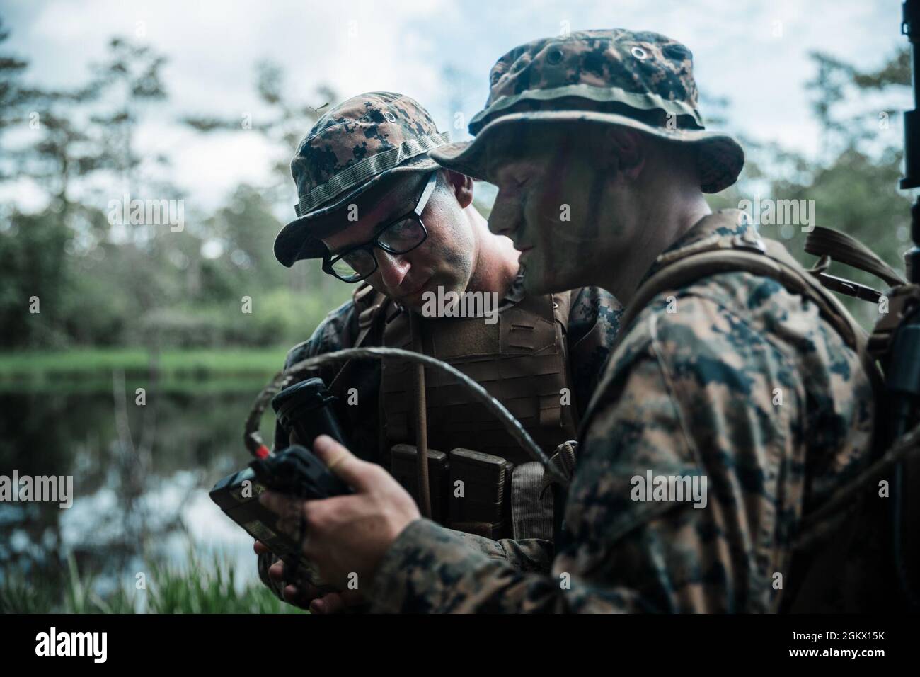 U.S. Marine Corps Lance Cpl. Jonah Lowe, left, and Cpl. Kenny Law, both ...