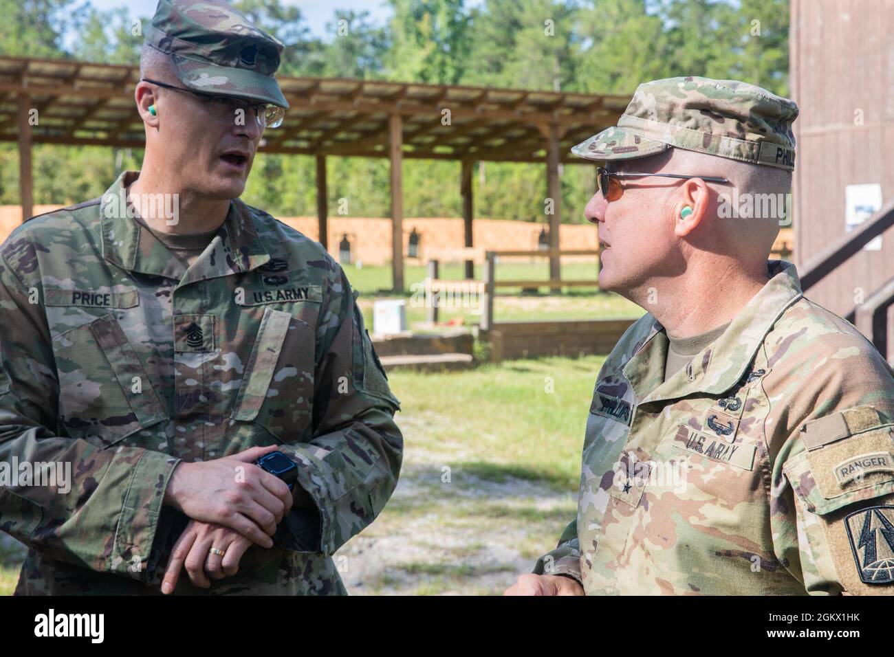 Maj. Gen. John H. Phillips (left) and Command Sgt. Maj. Russell Price ...