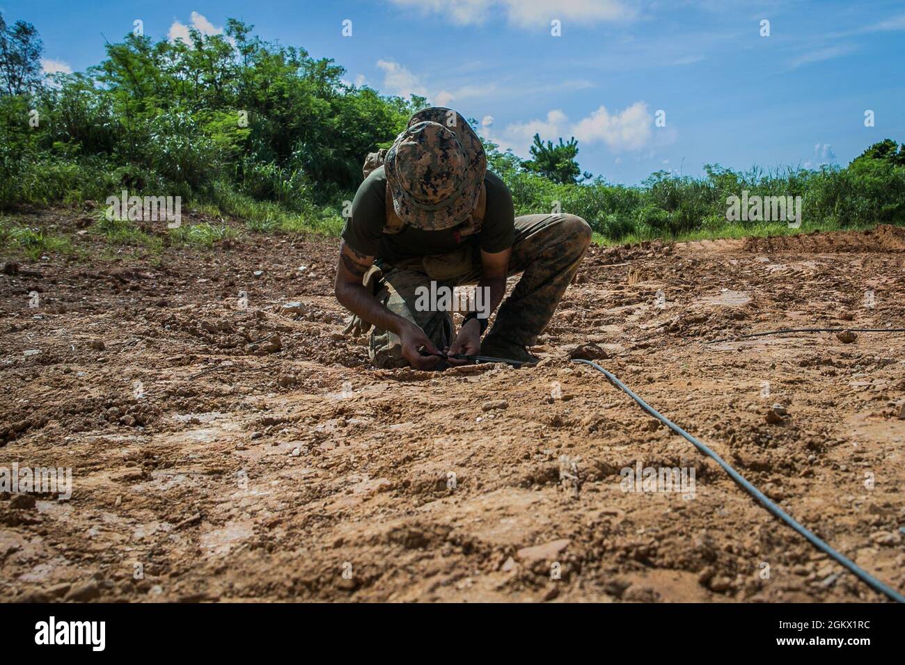 U.S. Marine Corps Sgt. Alexander Moore, an explosive ordnance disposal ...