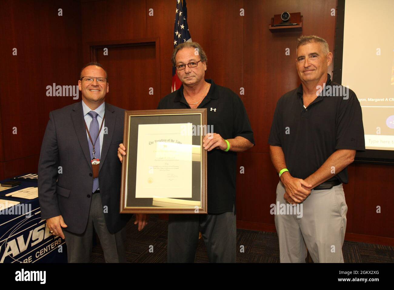 Joseph Schonewolf receives his 40-year Career Service Award during a ...