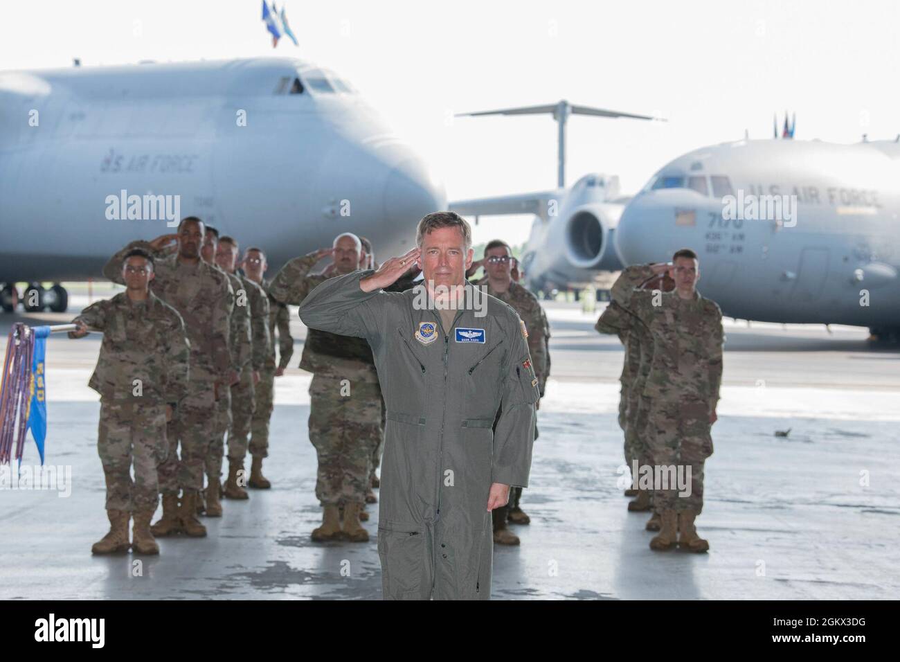 Airmen from the 436th Operations Group give Col. Scott Raleigh his ...