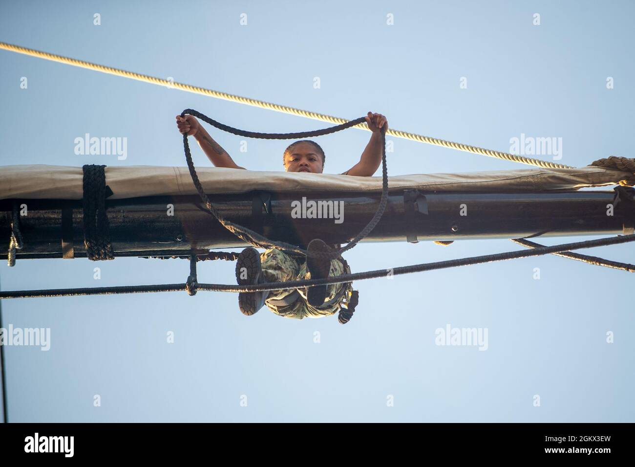BOSTON (July 15, 2021) Seaman Jordan Sharp, from Cincinnati, unties a ...