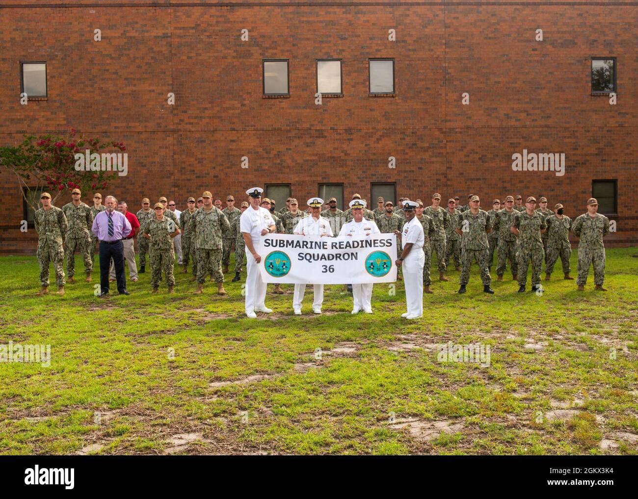 From left to right: Command Master Chief Ed Rathgeber, Submarine Group ...