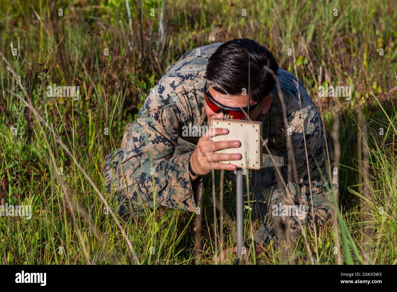 U.S. Marine Corps Lance Cpl. Carlos Hickman, a surveillance sensor ...