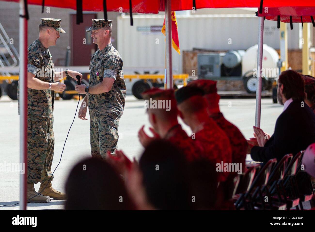 U.S. Marine Col. Nathan S. Marvel, left, the commanding officer of ...
