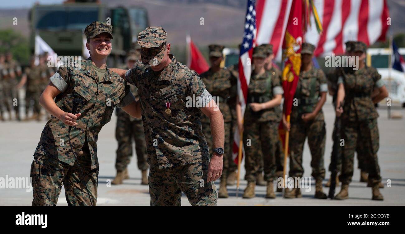 U.S. Marine Lt. Col. Forest J. Rees III, right, the outgoing commanding ...