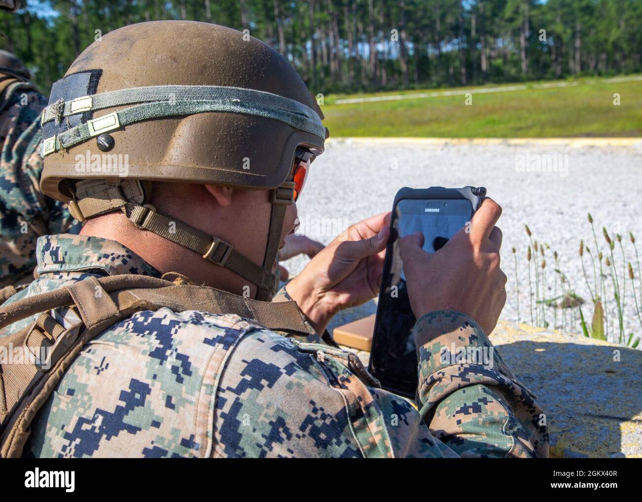 U.S. Marine Corps Lance Cpl. Carlos Hickman, a surveillance sensor ...