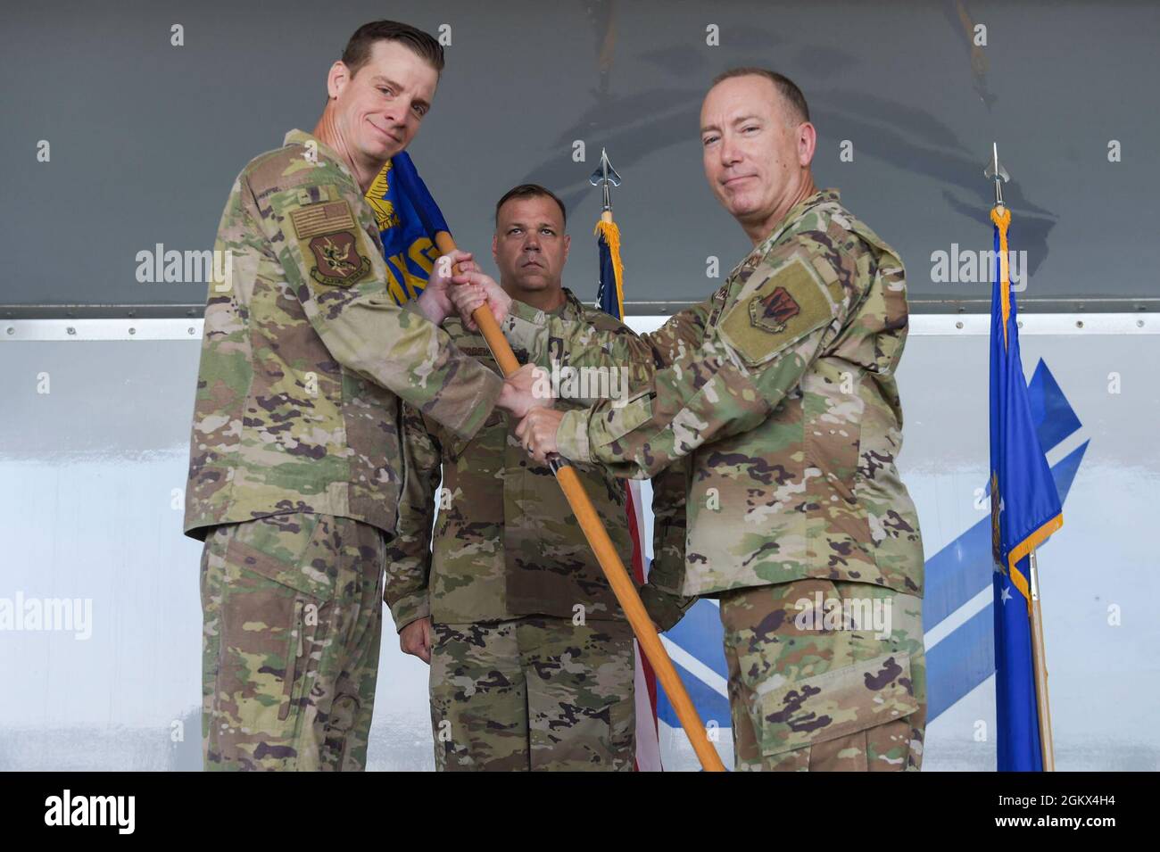 U.S. Air Force Col. Stephen M. Harvey, right, relinquishes command of the 23d Maintenance Group ...